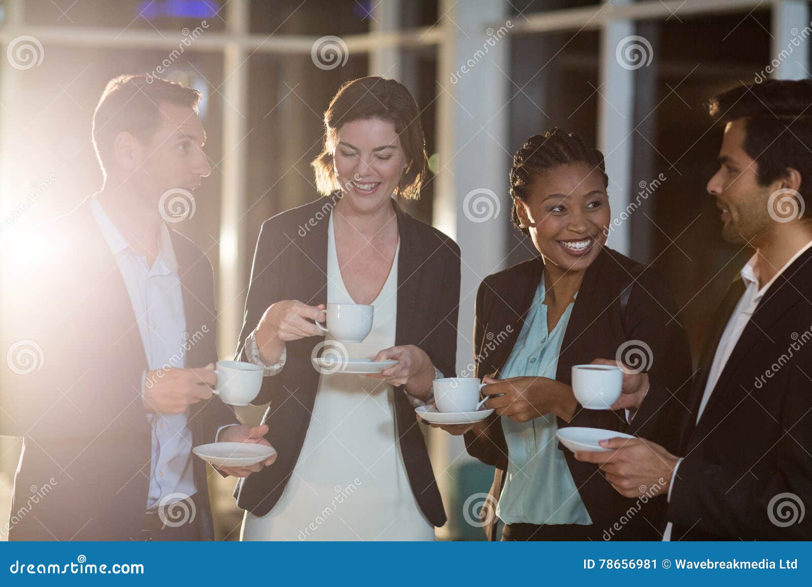 Group of Businesspeople Having Coffee during Break Stock Image - Image ...