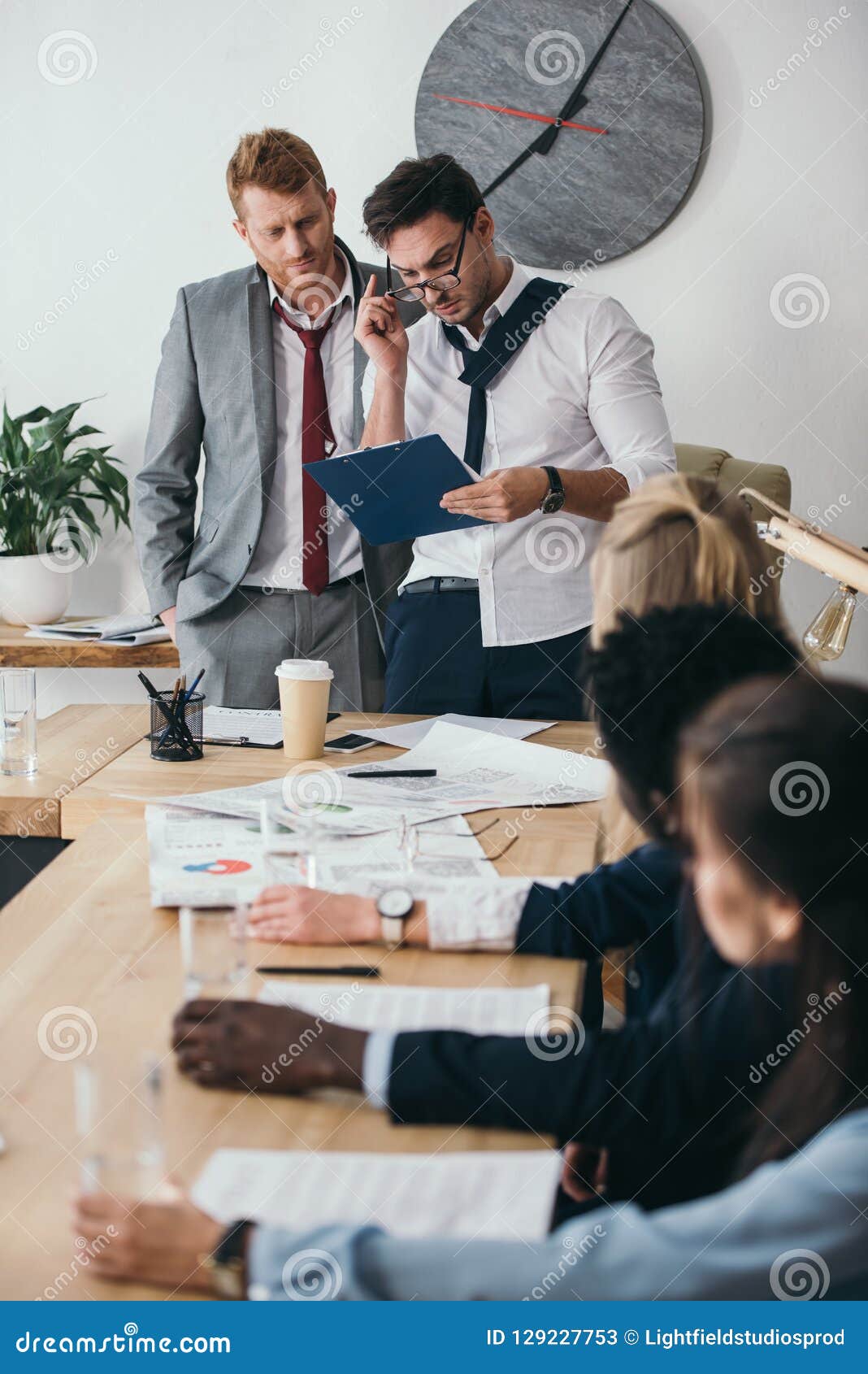 Group of Businesspeople Having Conversation in Conference Hall Stock ...