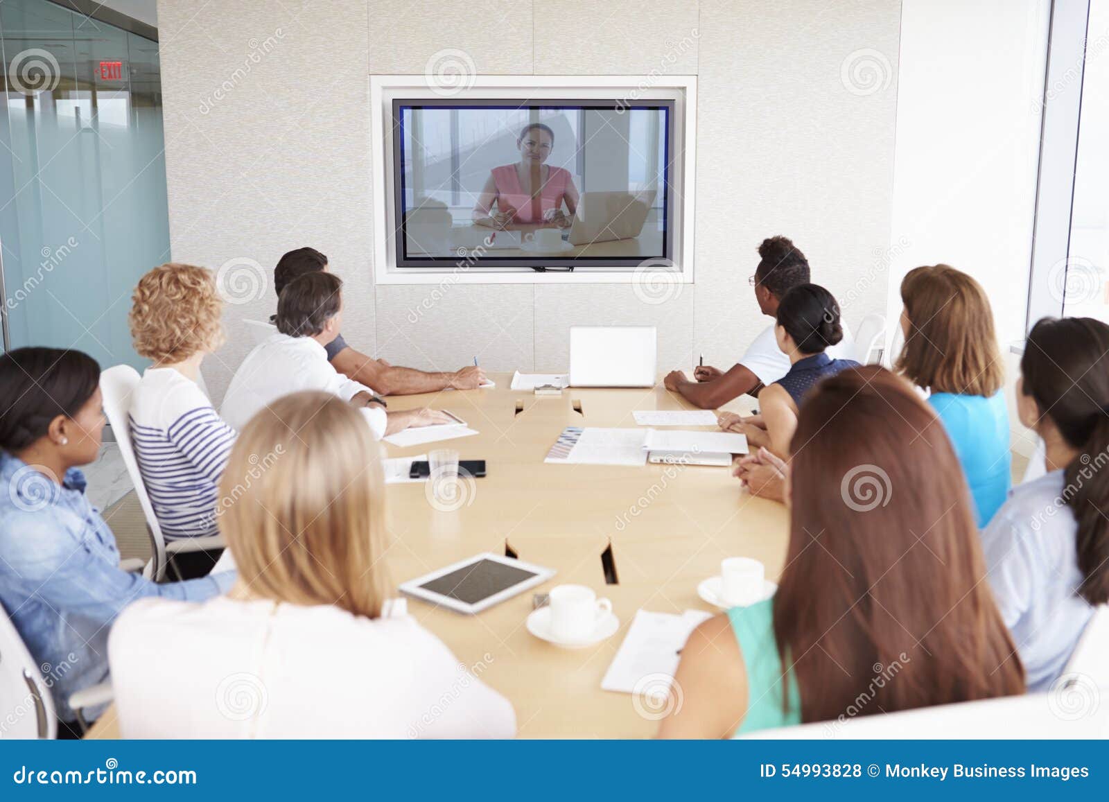 Group of Businesspeople Having Video Conference in Boardroom Stock ...