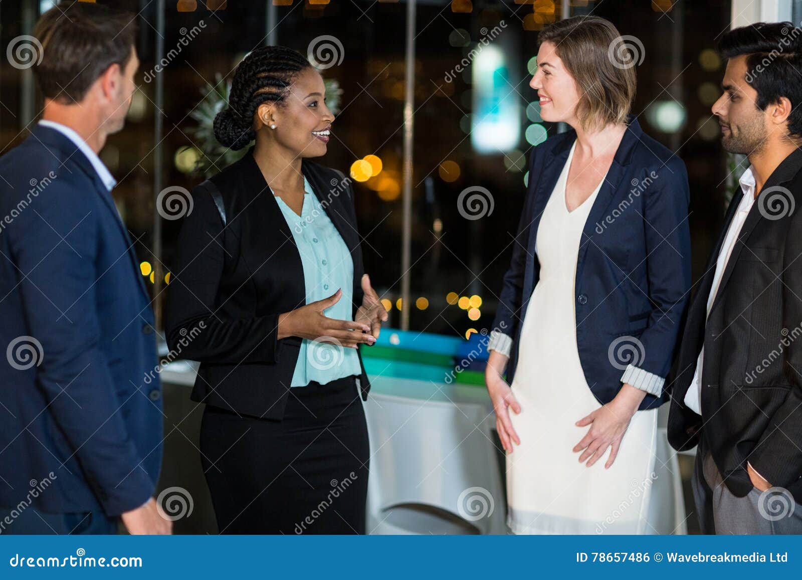 Group of Businesspeople Interacting with Each Other Stock Photo - Image ...