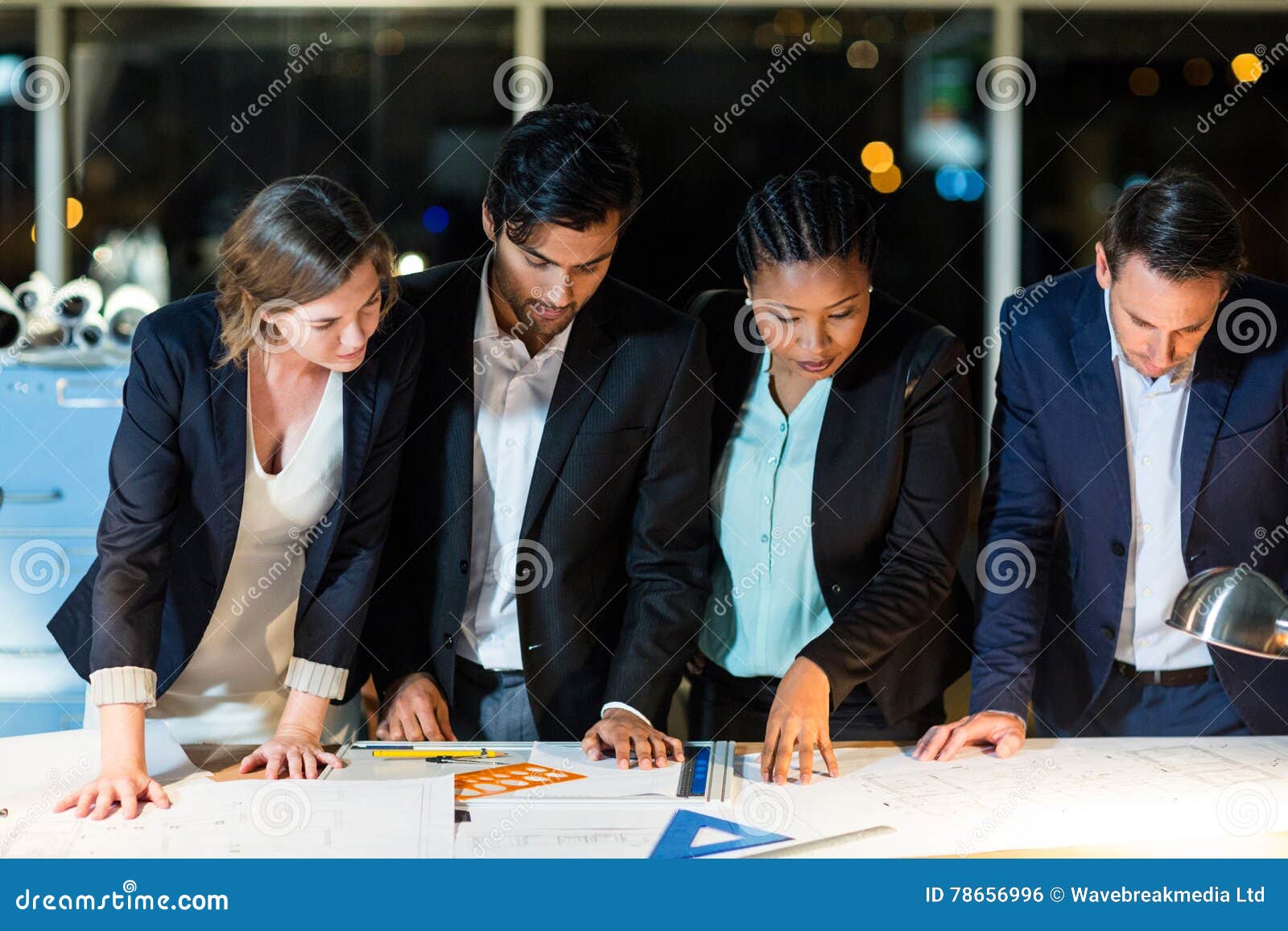 Group of Businesspeople Looking at the Document Stock Photo - Image of ...