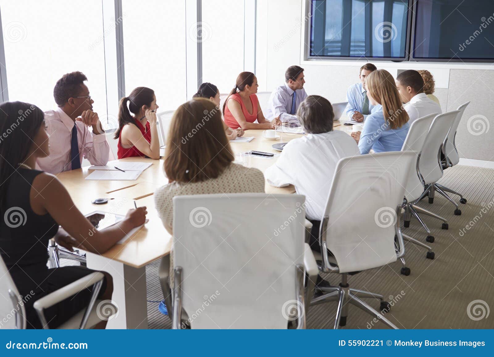 Group of Businesspeople Meeting Around Boardroom Table Stock Image ...
