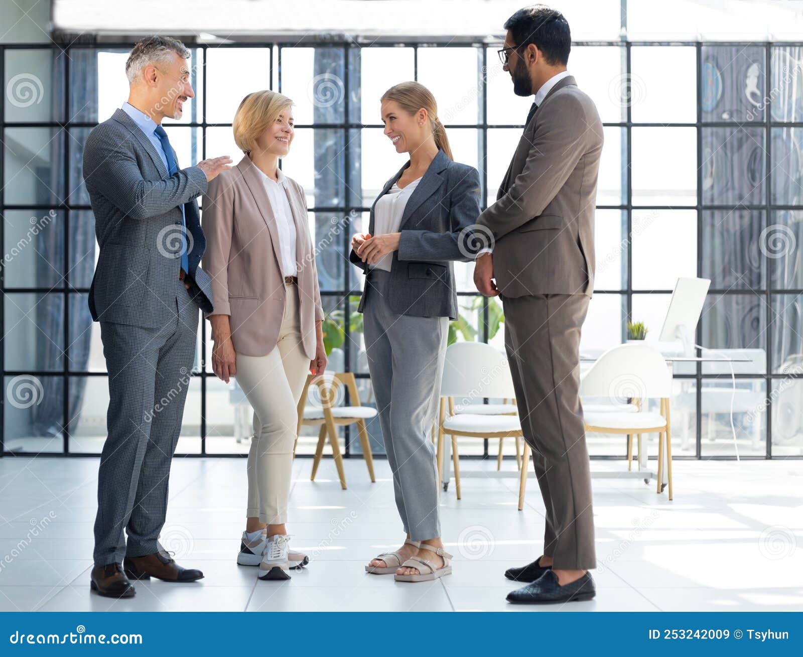 Group of Businesspeople Standing Together in Office. Stock Image ...