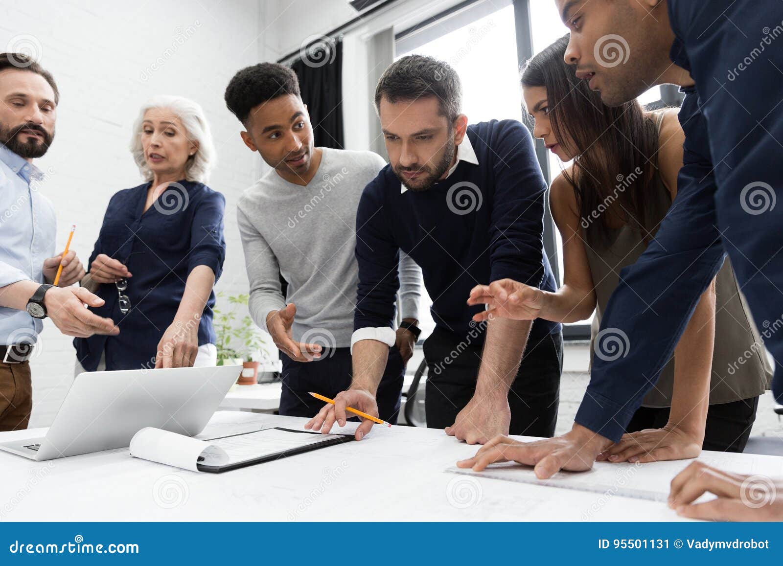 Group of Businesspeople Working at a Table in the Office Stock Image ...