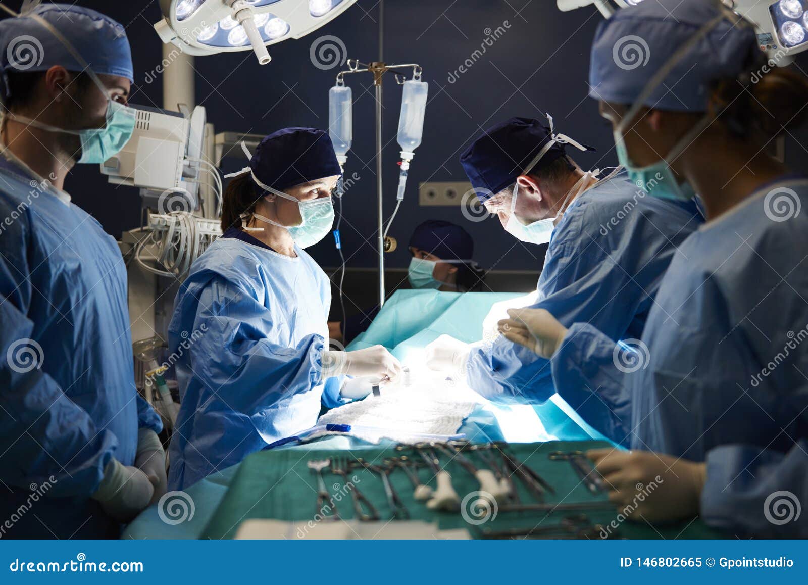 Group of Busy Surgeons Over the Operating Table Stock Image - Image of ...