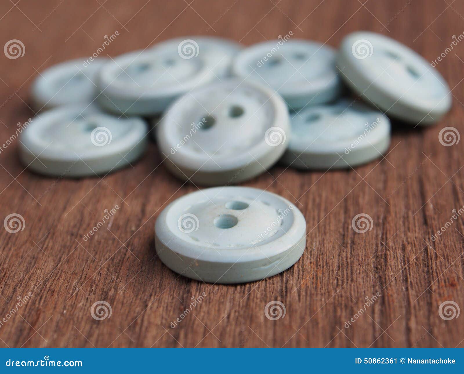 Group of Buttons on the Wooden Table Stock Image - Image of embellish ...