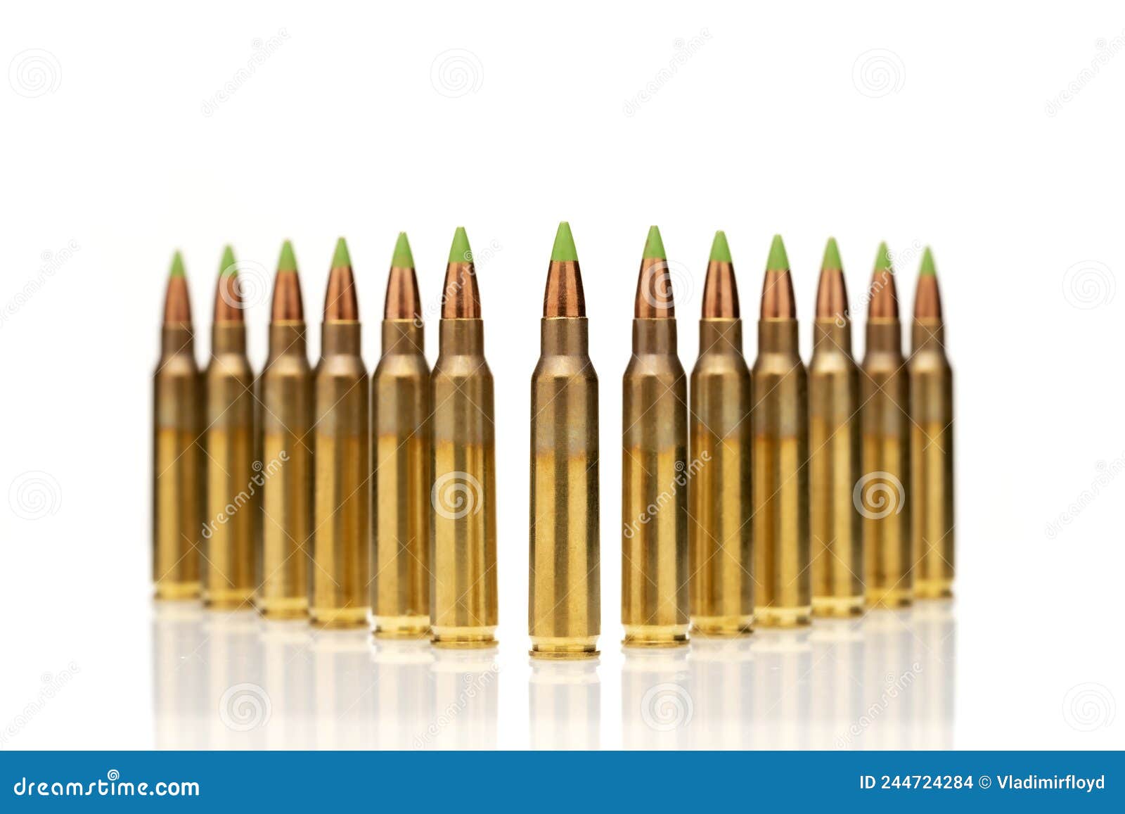 A Group of 5.56 Calibar, Green Tip Bullets Ordered into the Lines on ...