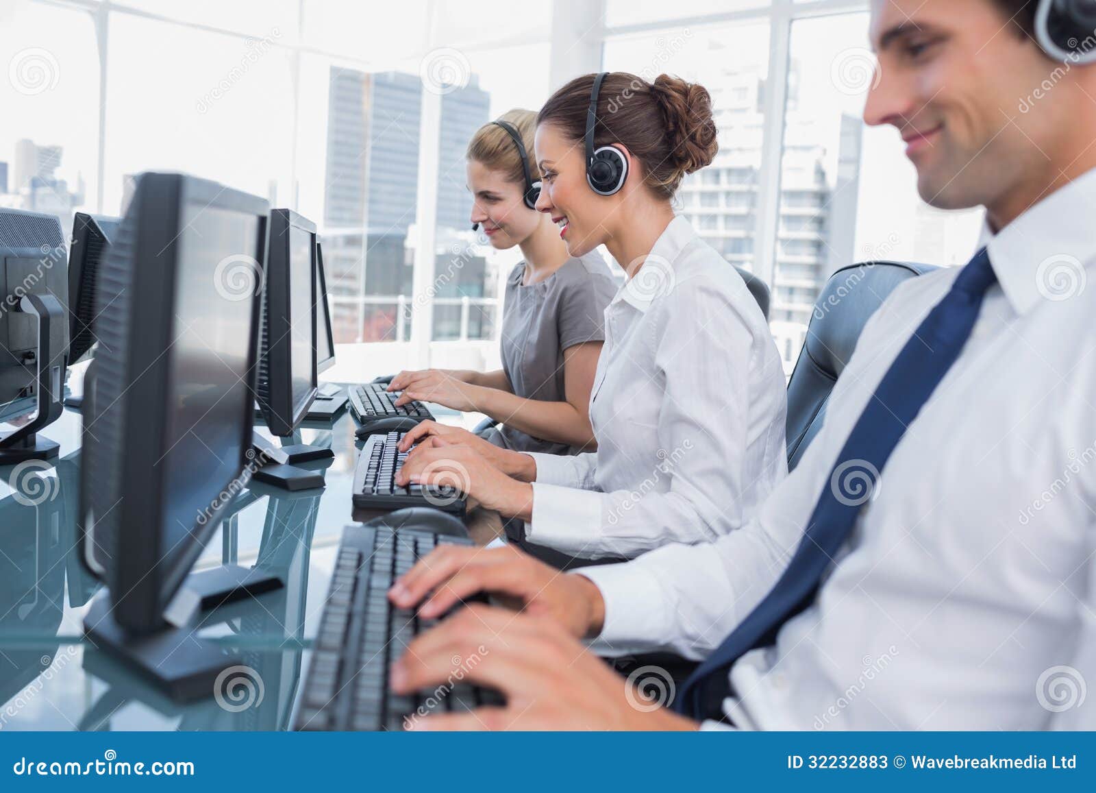 Group of Call Center Agents Working in Line Stock Image - Image of ...