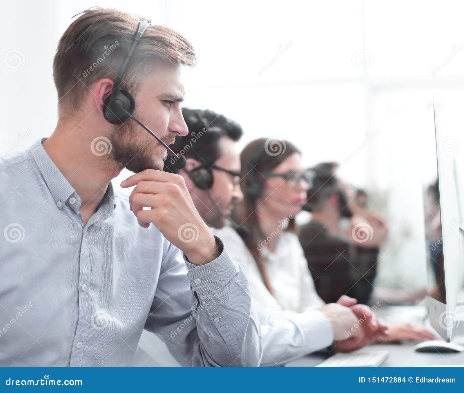 Group of Call Center Employees Sitting at the Desk Stock Photo - Image ...