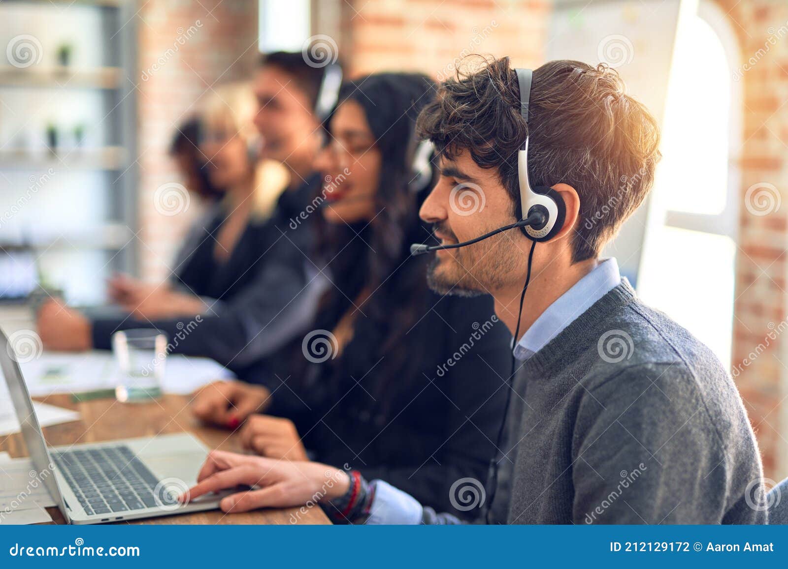Group of Call Center Workers Smiling Happy and Confident Stock Photo ...
