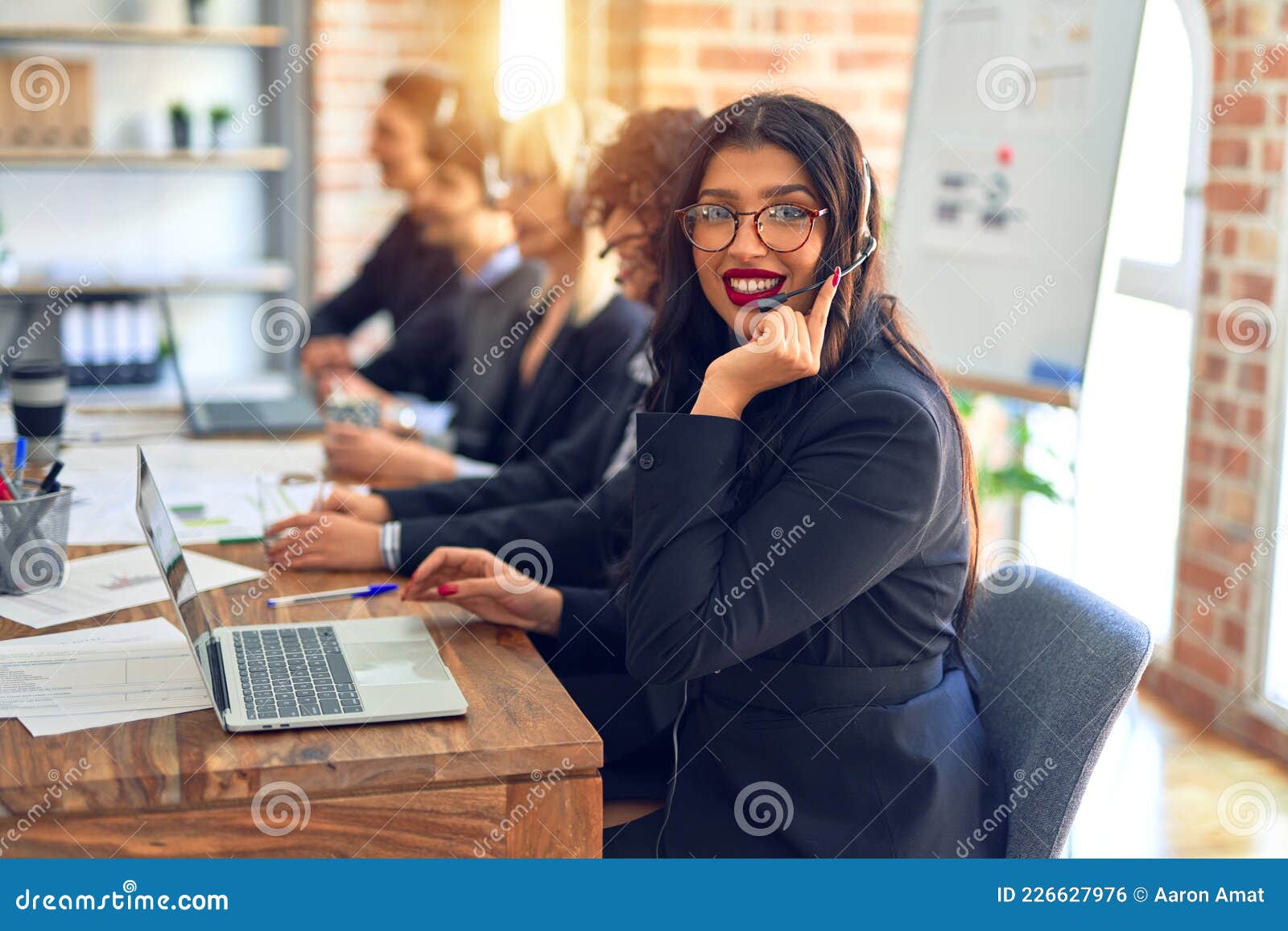 Group of Call Center Workers Smiling Happy and Confident Stock Photo ...