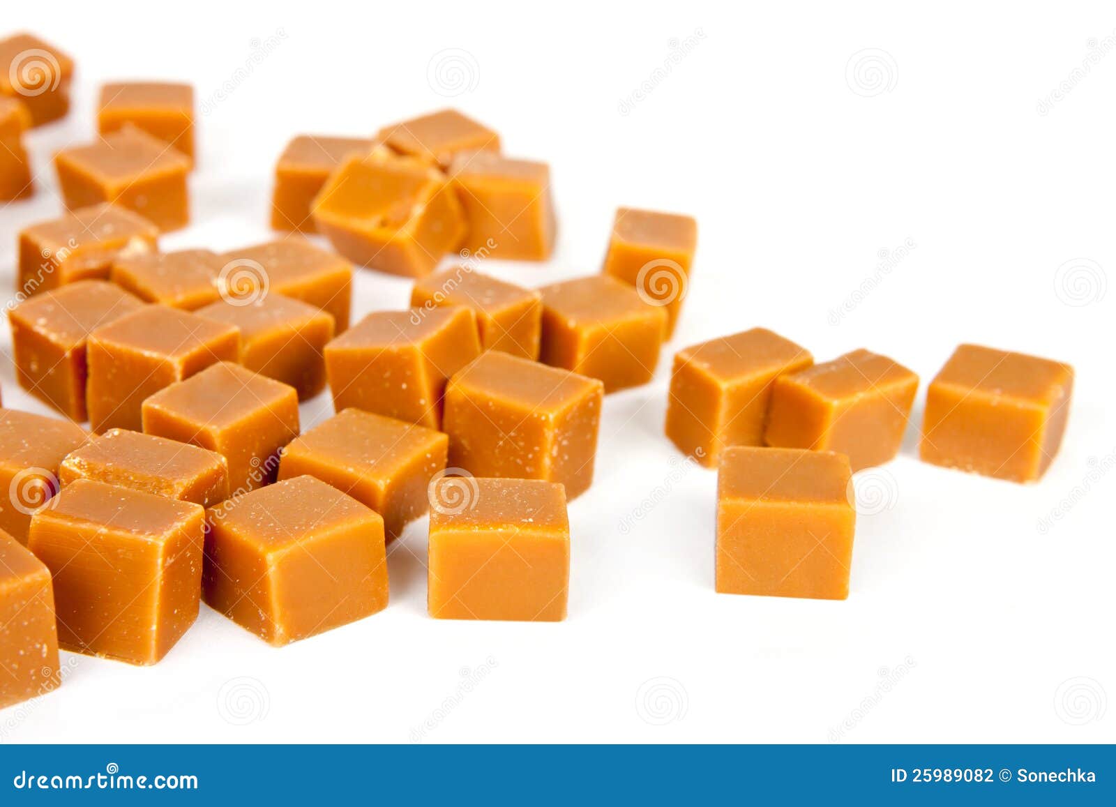 Caramel Candy With Liquid Caramel Topping And Almonds Nuts Stock Photo ...