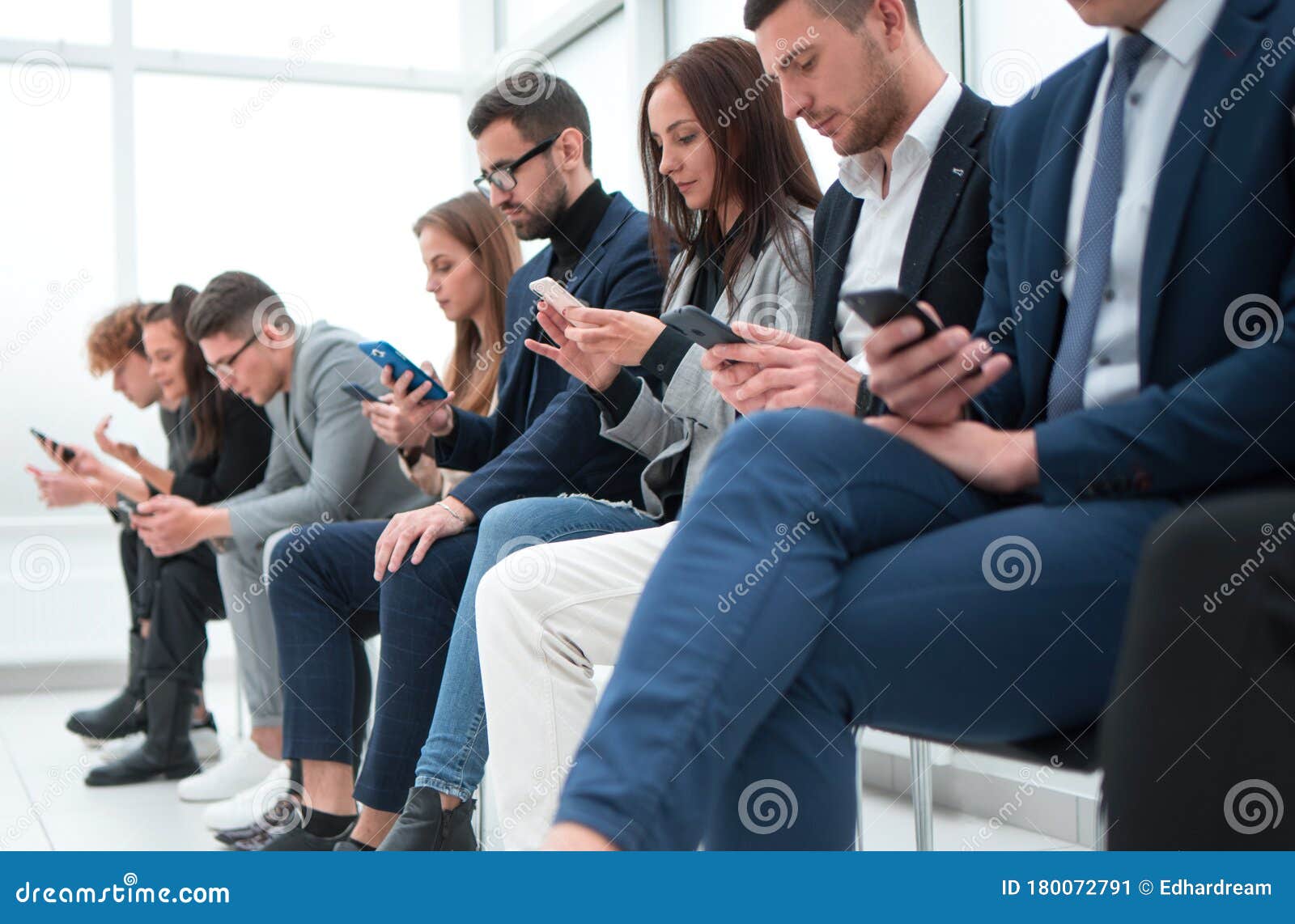 Group of Casual Young People Using Their Gadgets . Stock Image - Image ...
