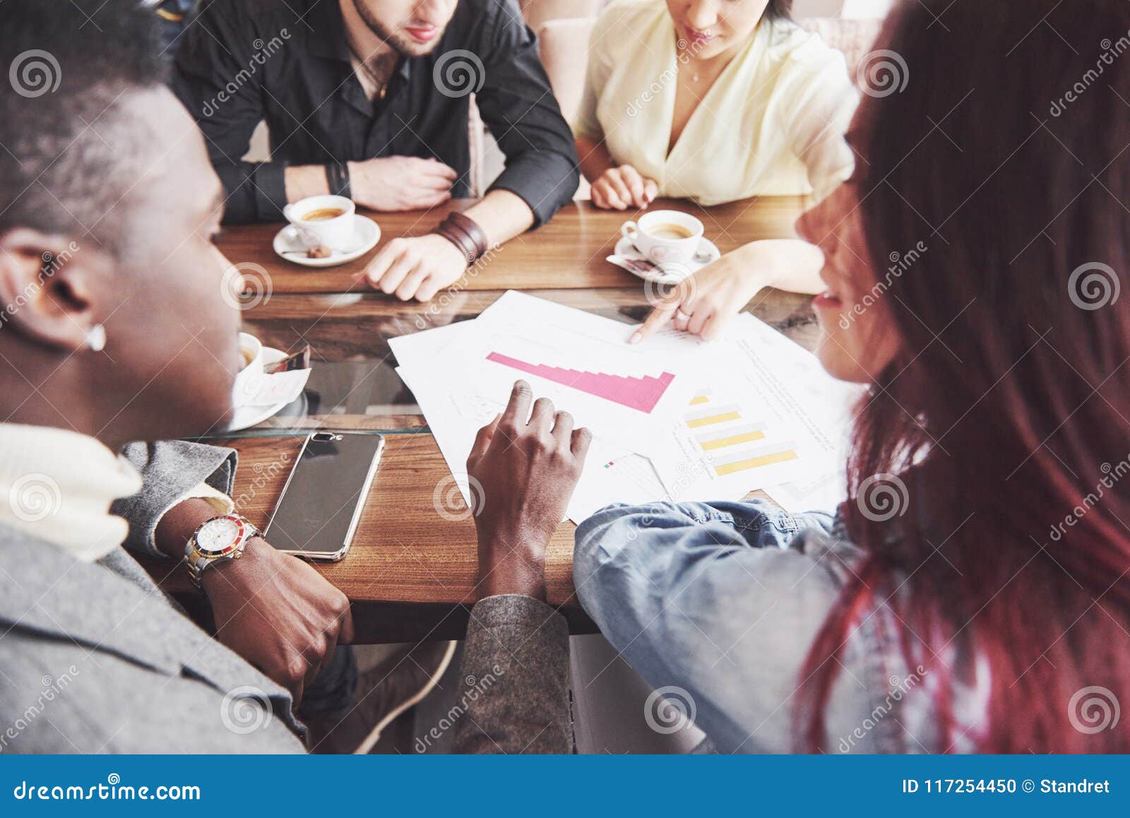 Group of Casually Dressed Businesspeople Discussing Ideas. Creative ...