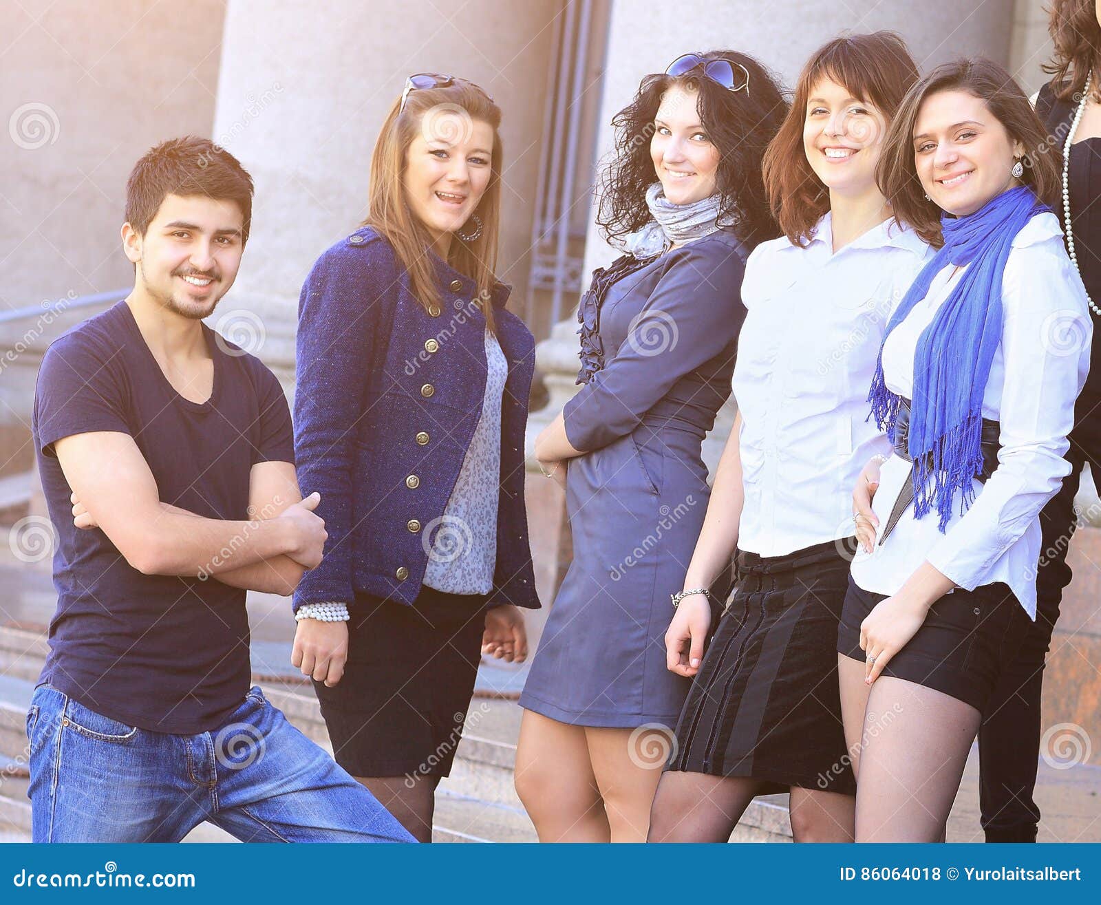 Group of a Cheerful Friendly College Students on the Steps Stock Photo ...