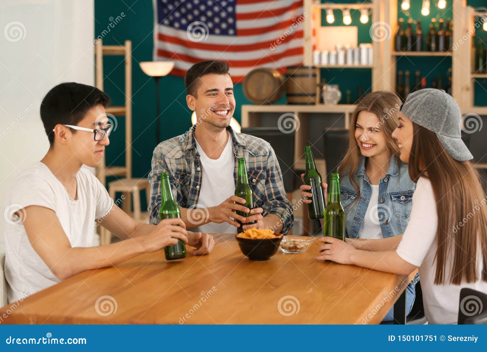 Group of Cheerful Friends Drinking Beer in Bar Stock Image - Image of ...