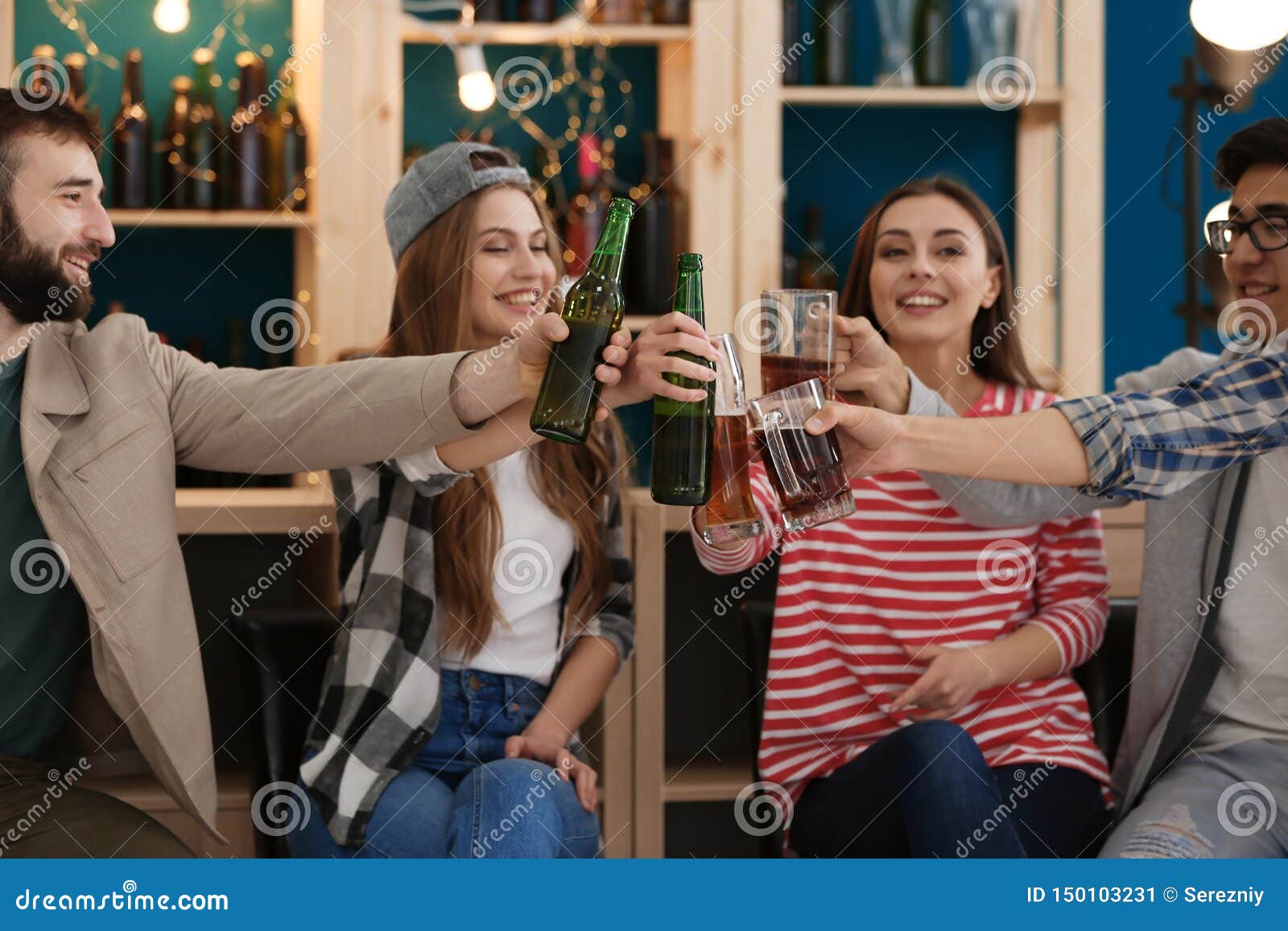 Group of Cheerful Friends Drinking Beer in Bar Stock Image - Image of ...