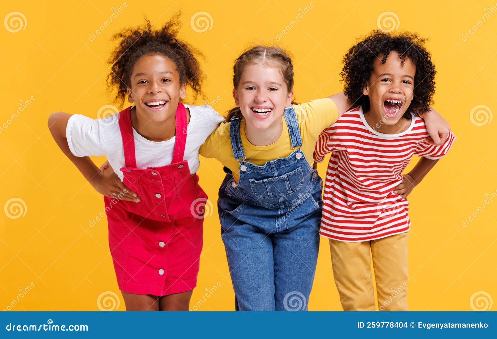 Group of Cheerful Happy Multinational Children on Yellow Background ...