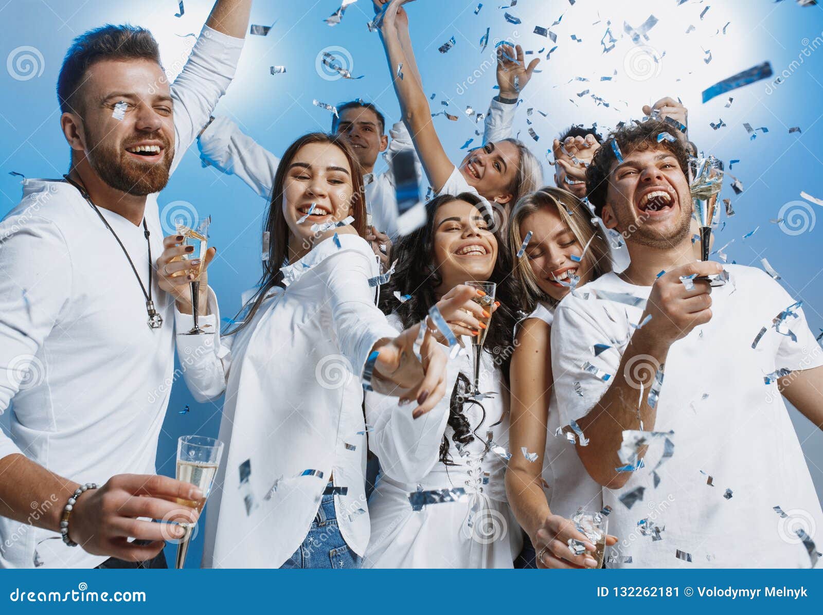 Group of Cheerful Joyful Young People Standing and Celebrating Together ... Group of Cheerful Joyful Young People Standing and Celebrating Together ...