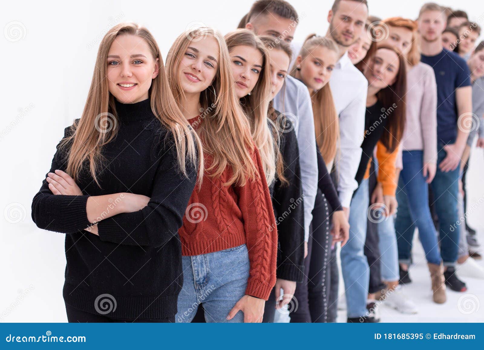 Group of Cheerful Young People Standing Behind Each Other Stock Image ...