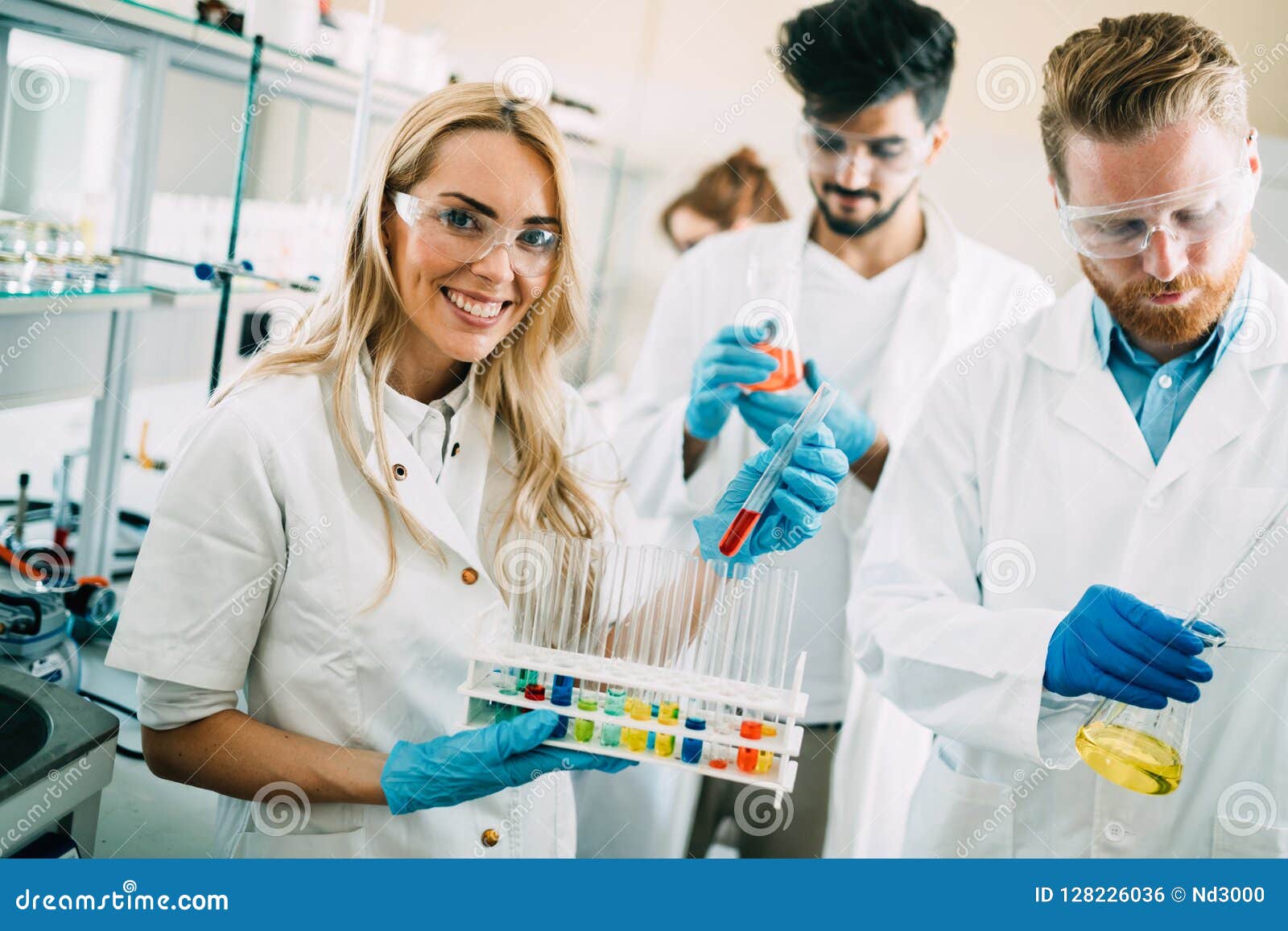 Group of Chemistry Students Working in Laboratory Stock Photo - Image ...