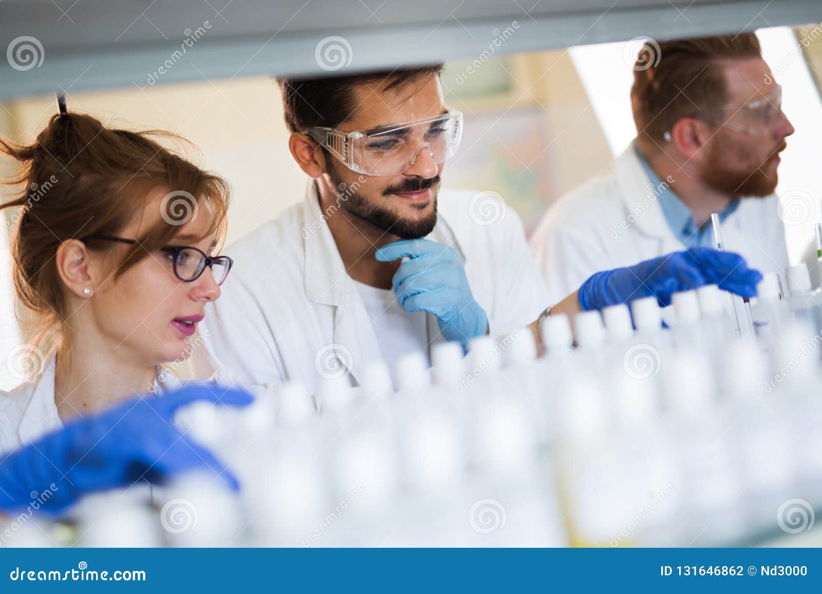 Group of Chemistry Students Working in Laboratory Stock Photo - Image ...