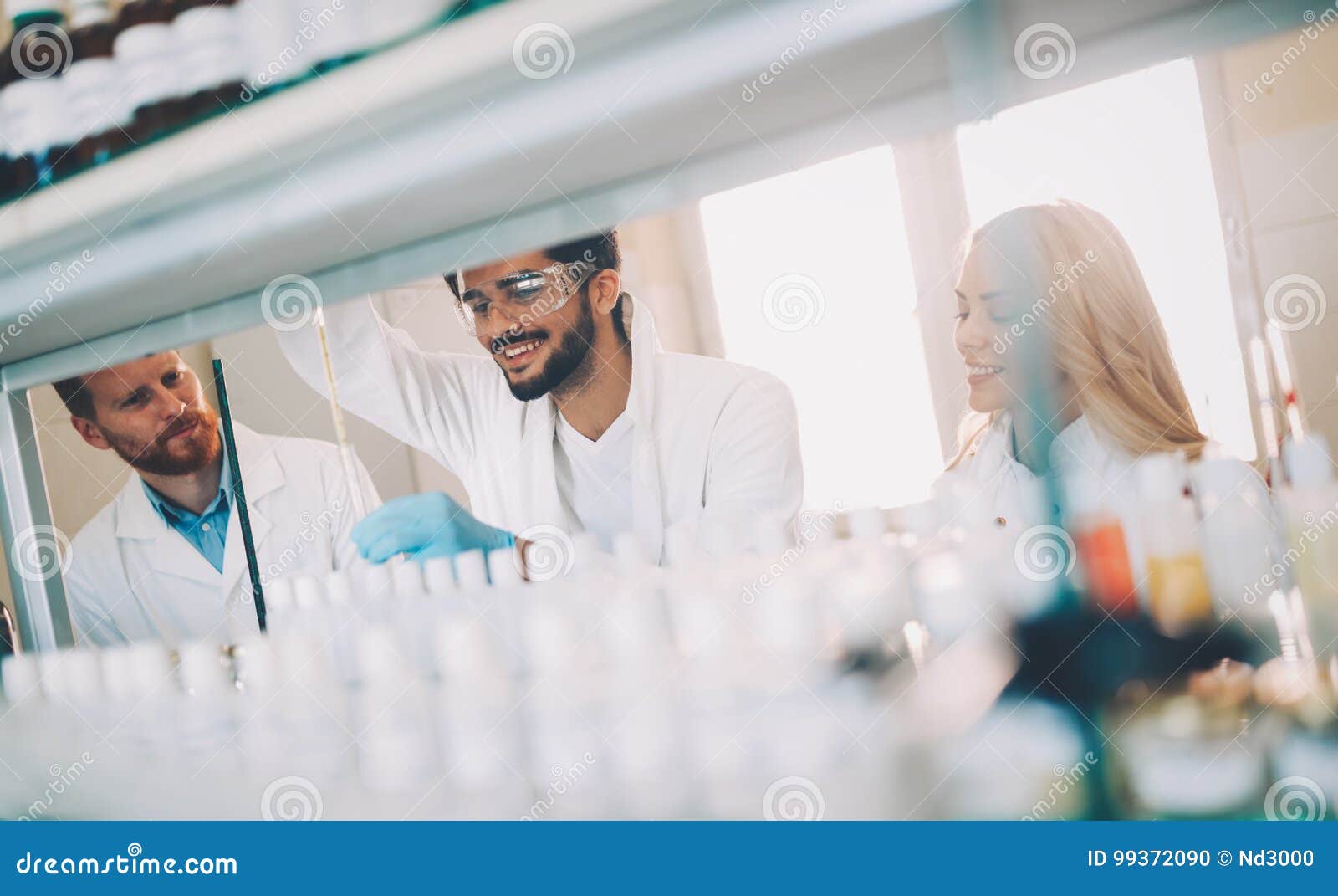 Group of Chemistry Students Working in Laboratory Stock Photo - Image ...