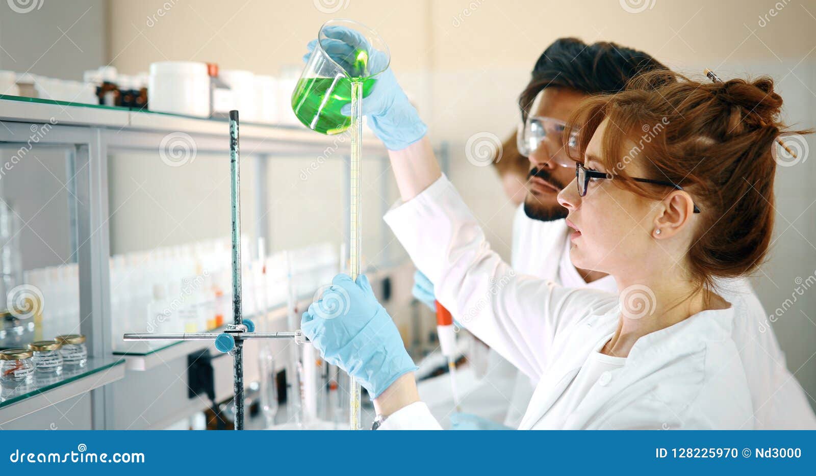 Group of Chemistry Students Working in Laboratory Stock Photo - Image ...