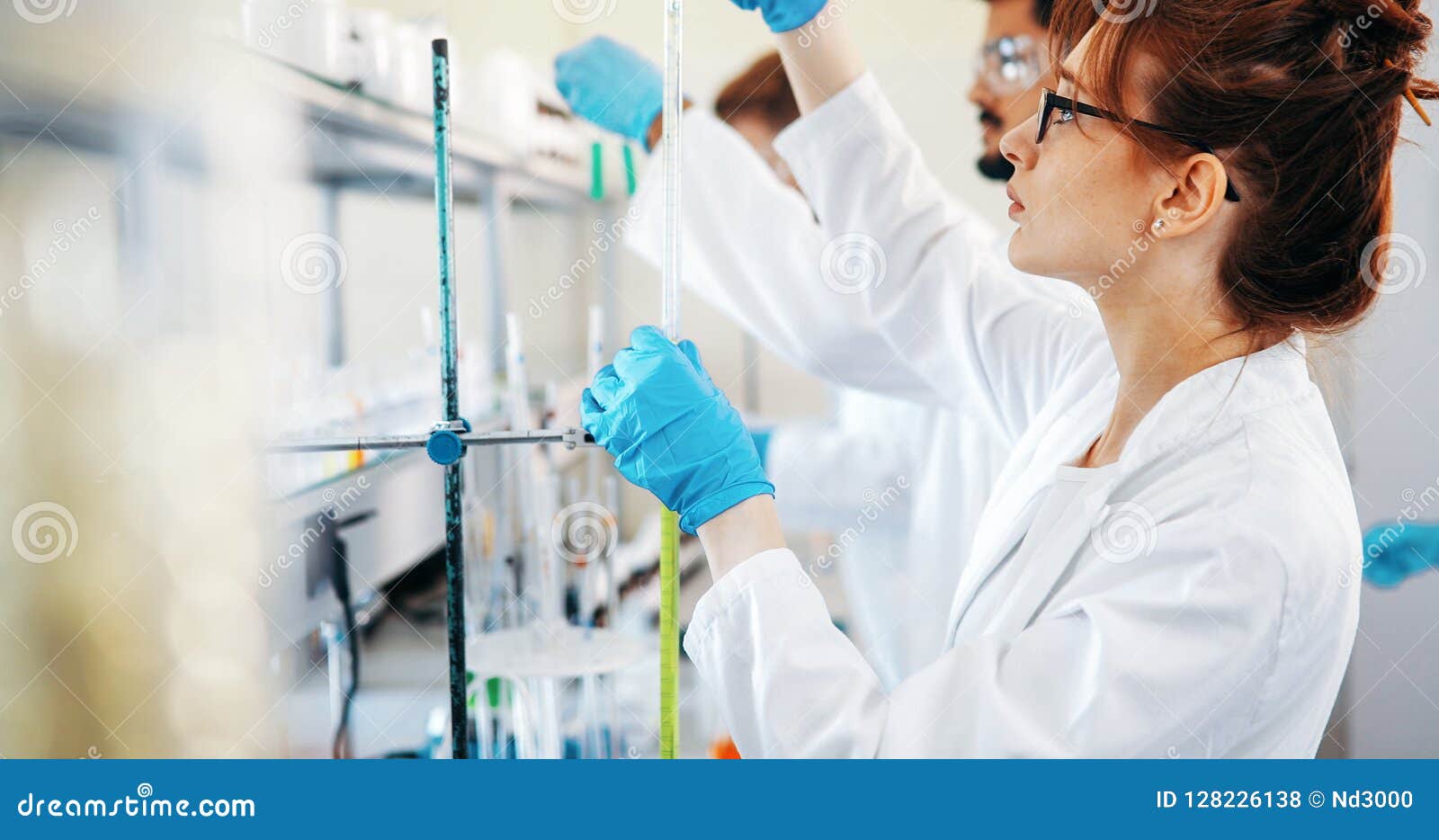 Group of Chemistry Students Working in Laboratory Stock Photo - Image ...