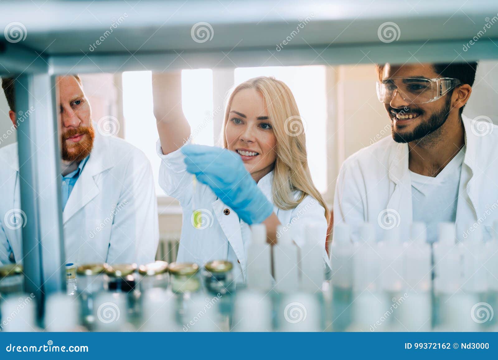 Group of Chemistry Students Working in Laboratory Stock Photo - Image ...