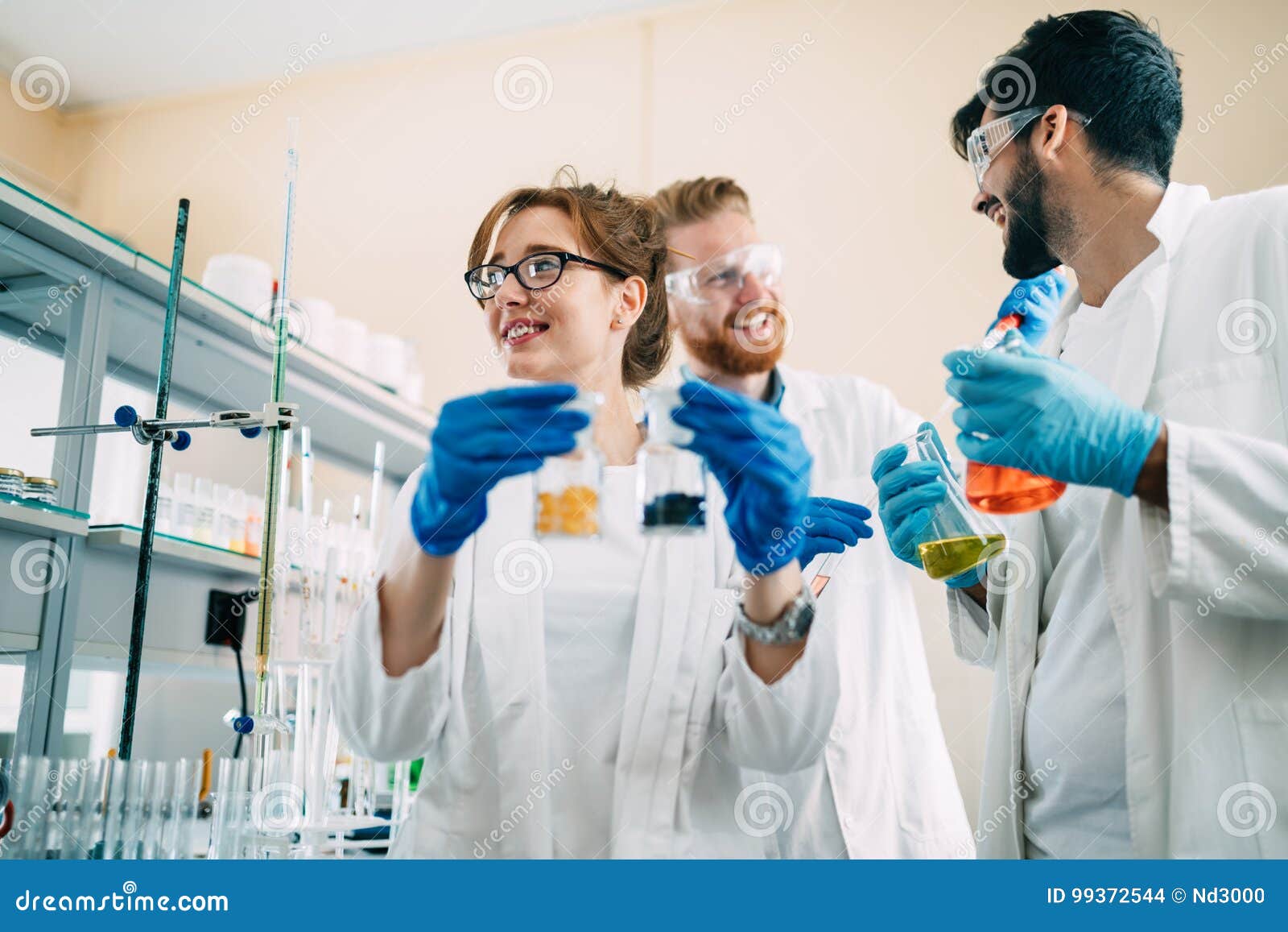 Group of Chemistry Students Working in Laboratory Stock Photo - Image ...