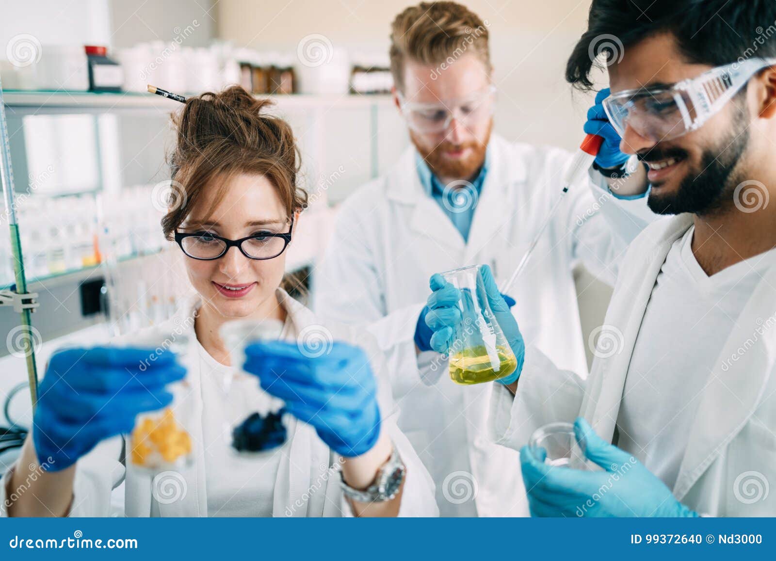 Group of Chemistry Students Working in Laboratory Stock Photo - Image ...