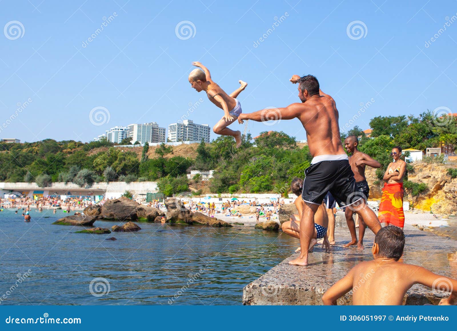 A Group of Children with a Coach Having Fun in the Sea Stock Image ...