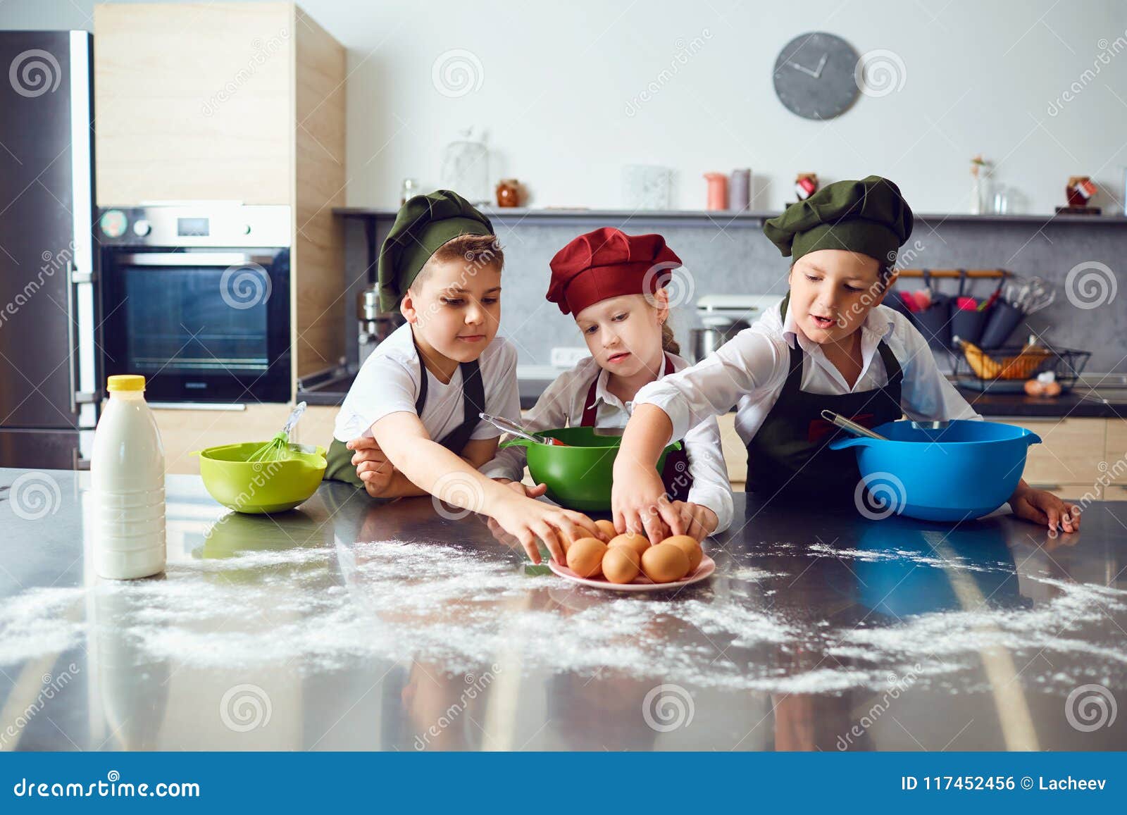 A Group of Children are Cooking in the Kitchen. Stock Photo - Image of ...