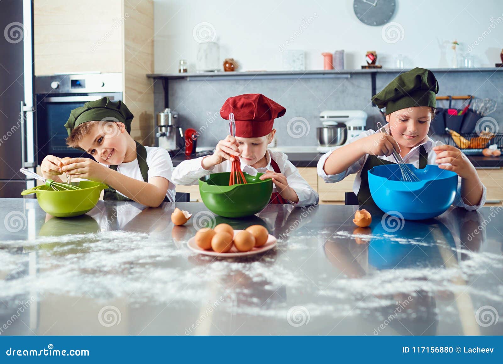 A Group of Children are Cooking in the Kitchen. Stock Photo - Image of ...