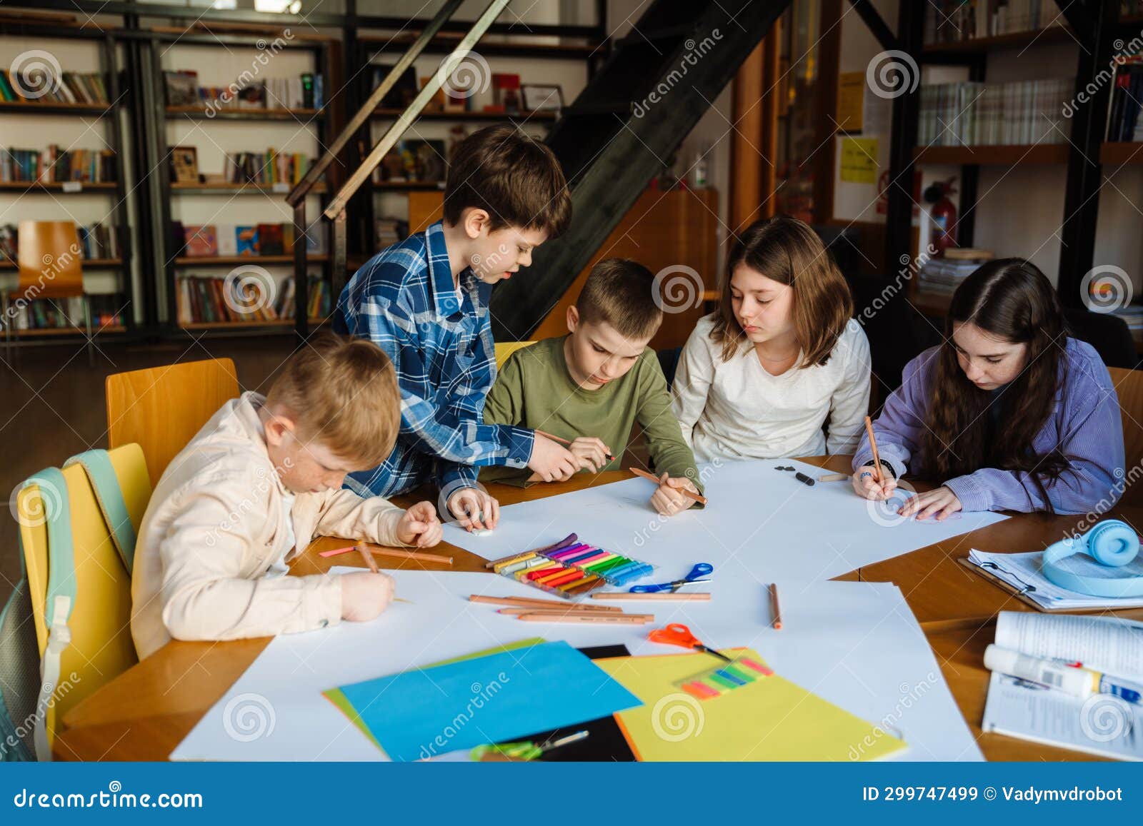 Group of Children Drawing during Art Lesson in Library Stock Image ...