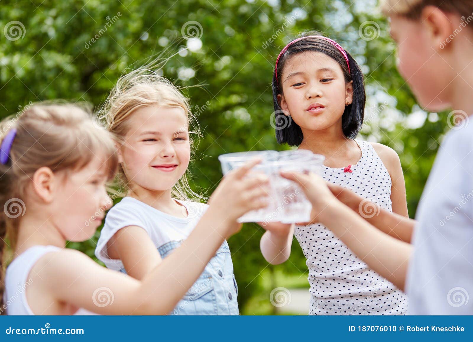 Group of Children Drinking Water in Summer Stock Photo - Image of ...