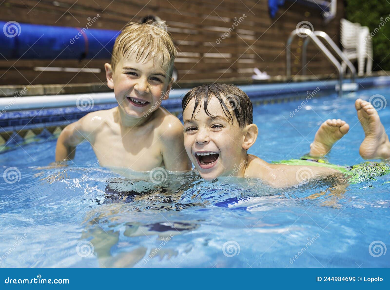 Two Boy Brother Having Fun in Pool on the Summer Time Stock Image ...