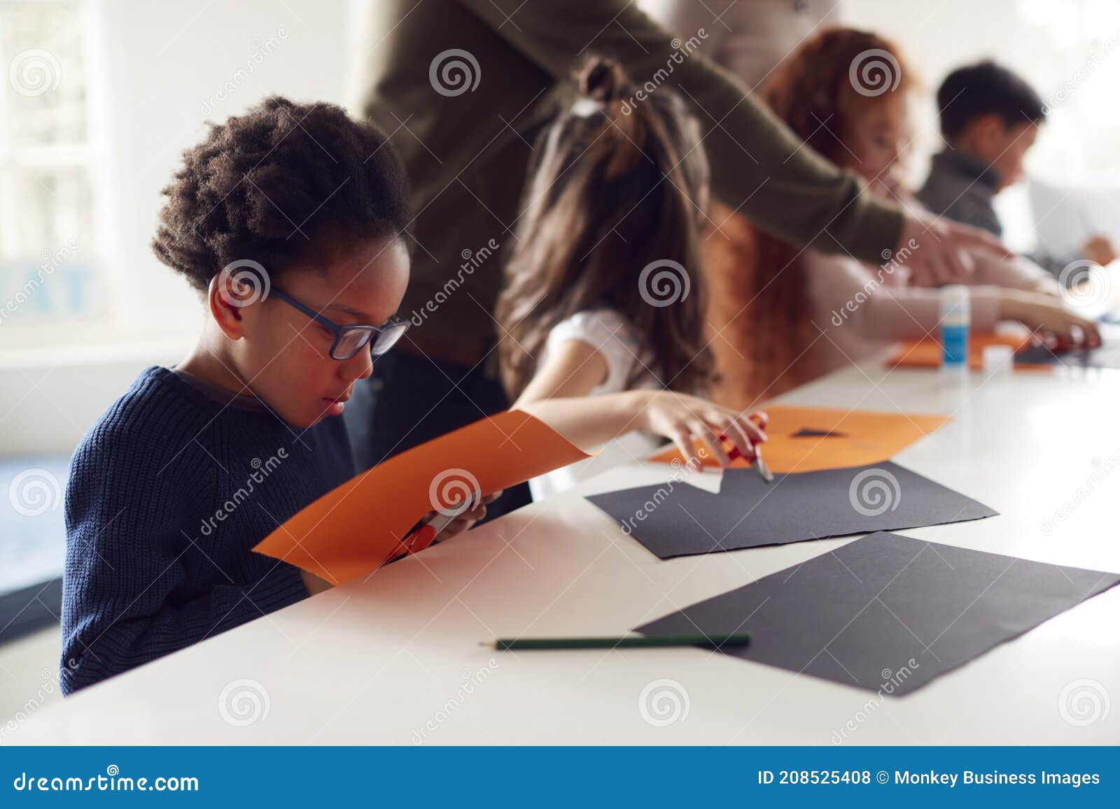 Group of Children at Home with Parents Having Fun Making Craft Together ...