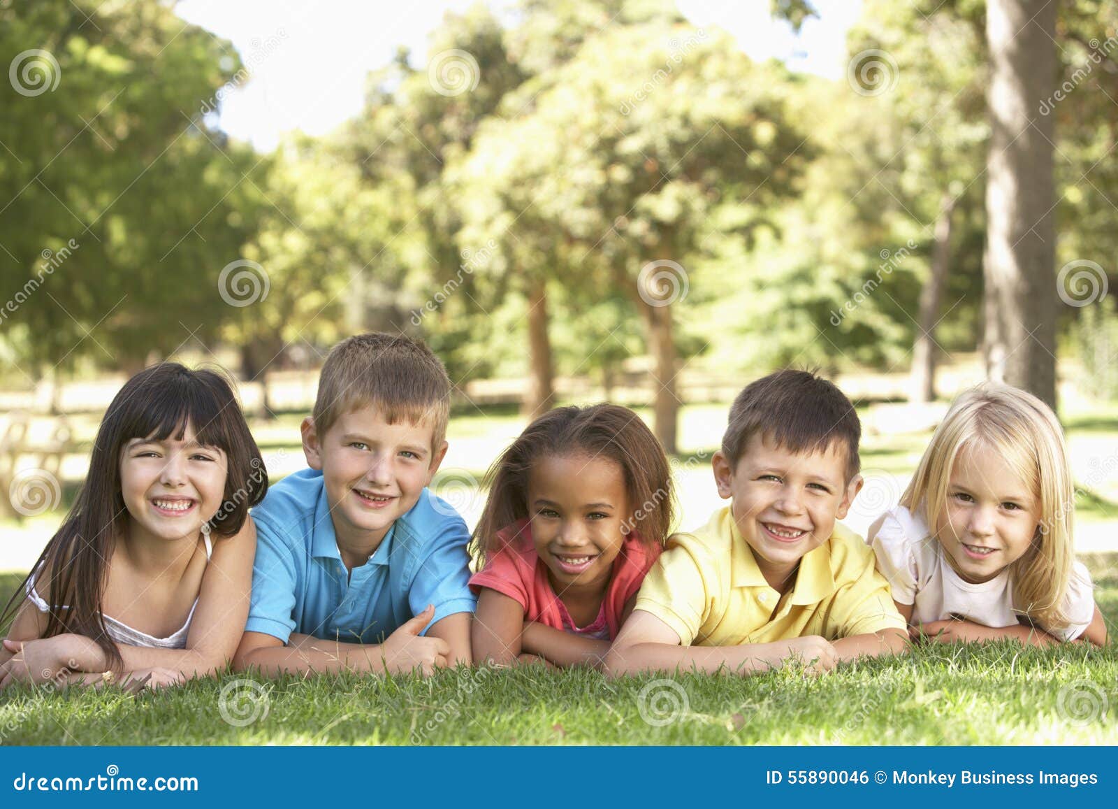 Group of Children Laying in Park Stock Photo - Image of laughter, five ...