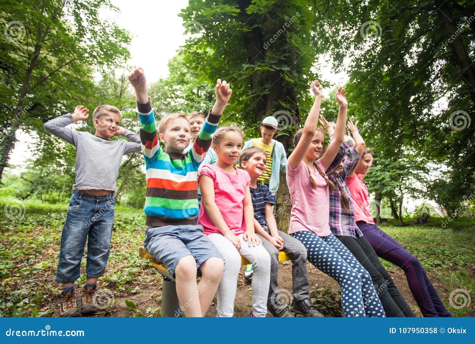 Group of Children on a Park Bench Stock Photo - Image of camp ...