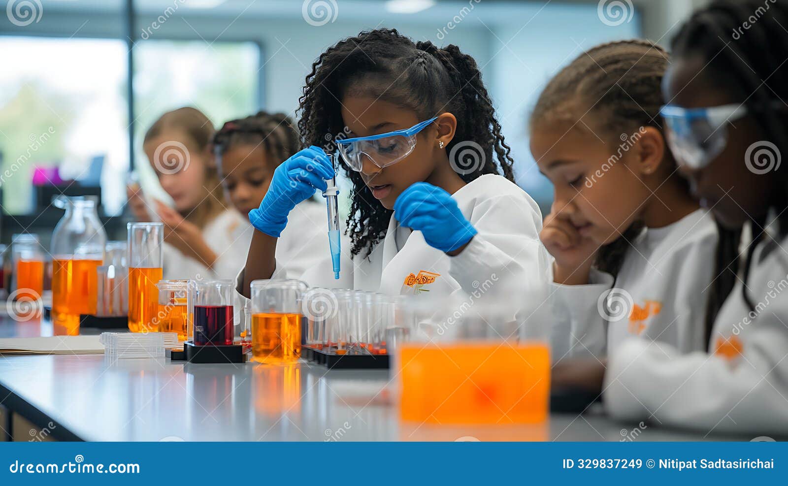 A Group of Children Participating in a Science Experiment in a Well ...
