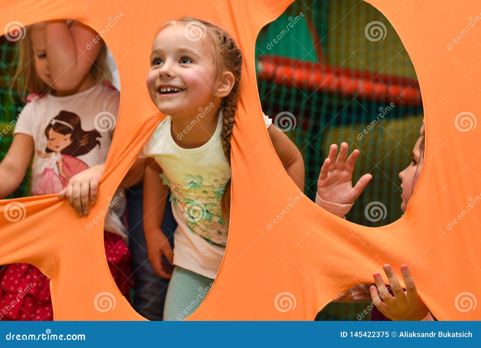 A Group of Children Playing Active Cs Games with a Cheese Sheet at a ...