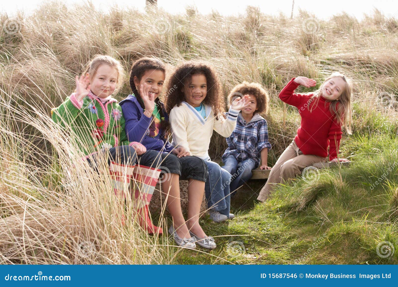 Group of Children Playing in Field Together Stock Photo - Image of race ...