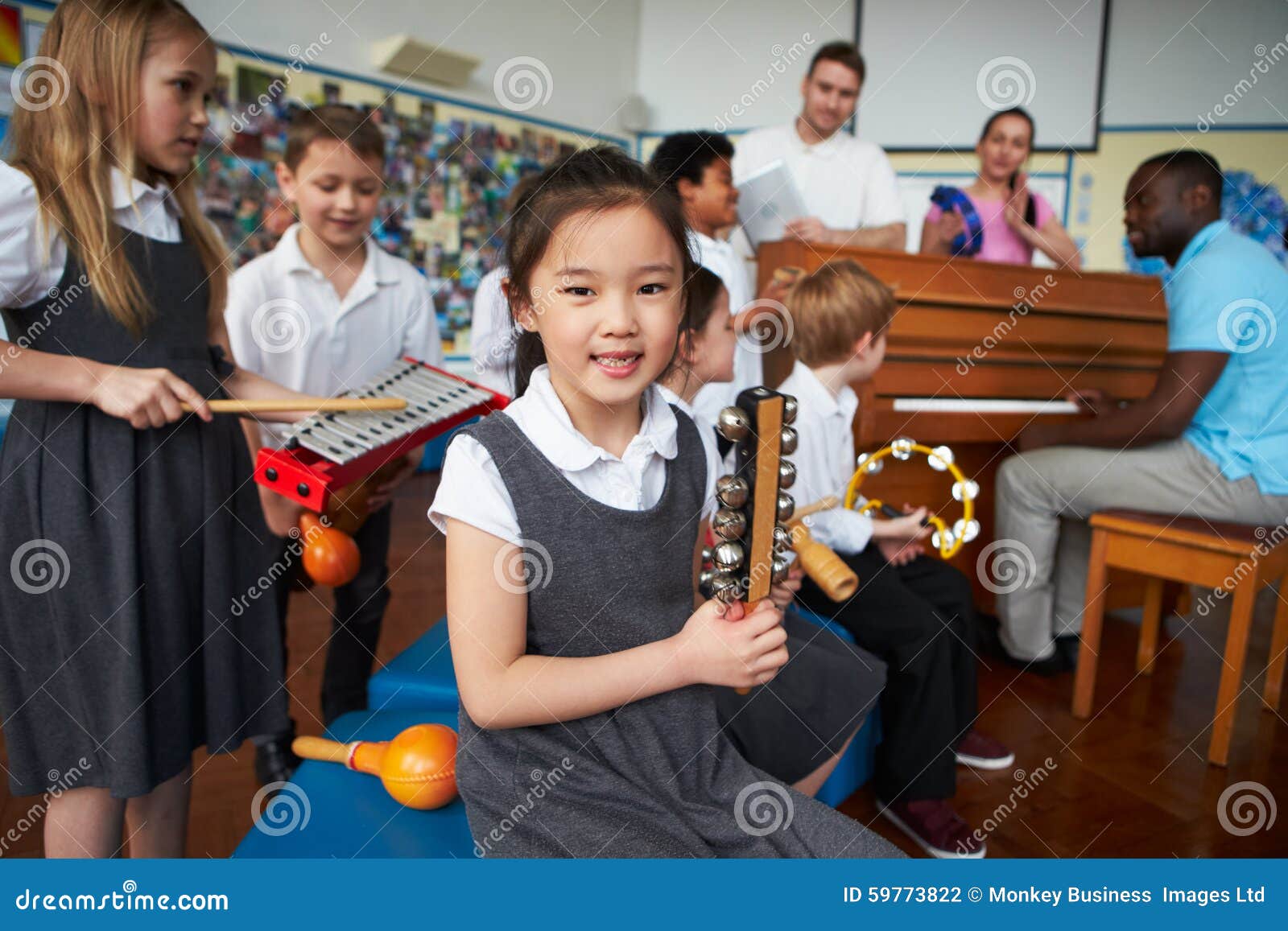 Group of Children Playing in School Orchestra Together Stock Photo ...