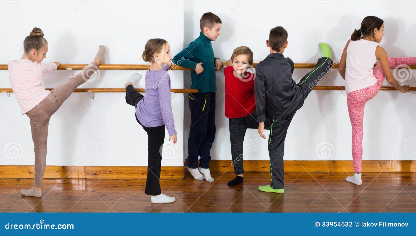 Group of Children Practicing at the Ballet Barre Stock Photo - Image of ...