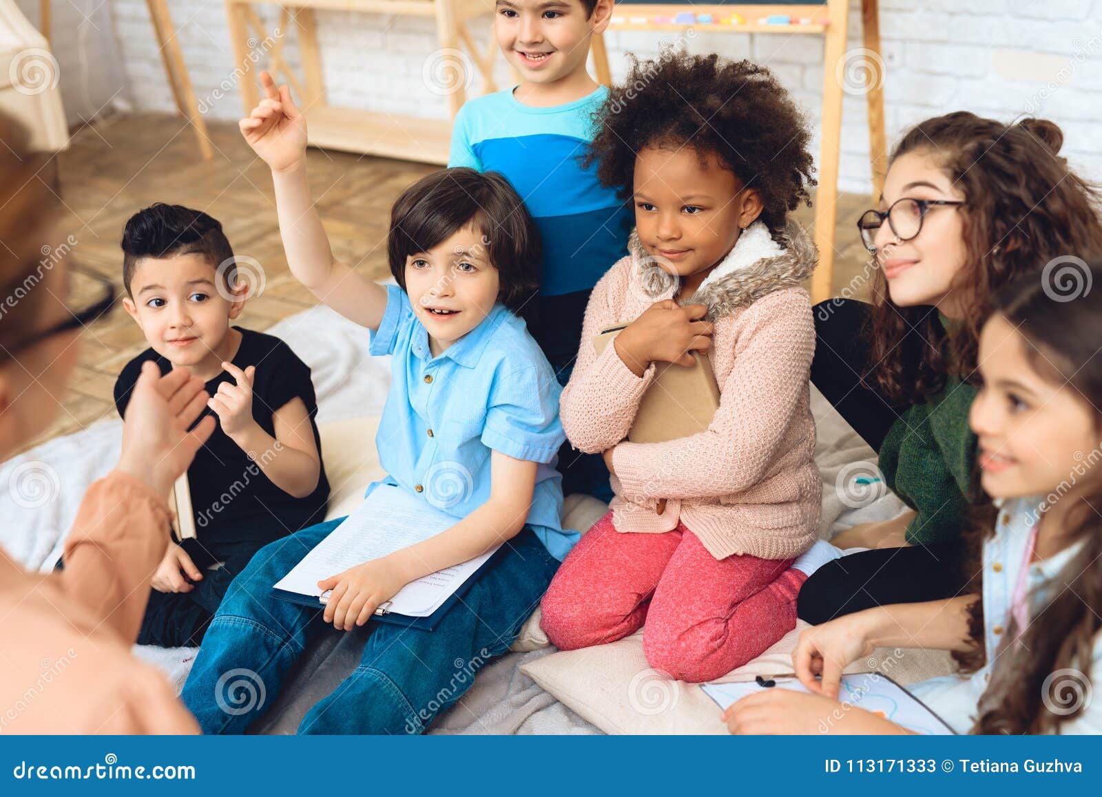 Group of Children are Pulling Hands To Answer Teacher`s Question in ...