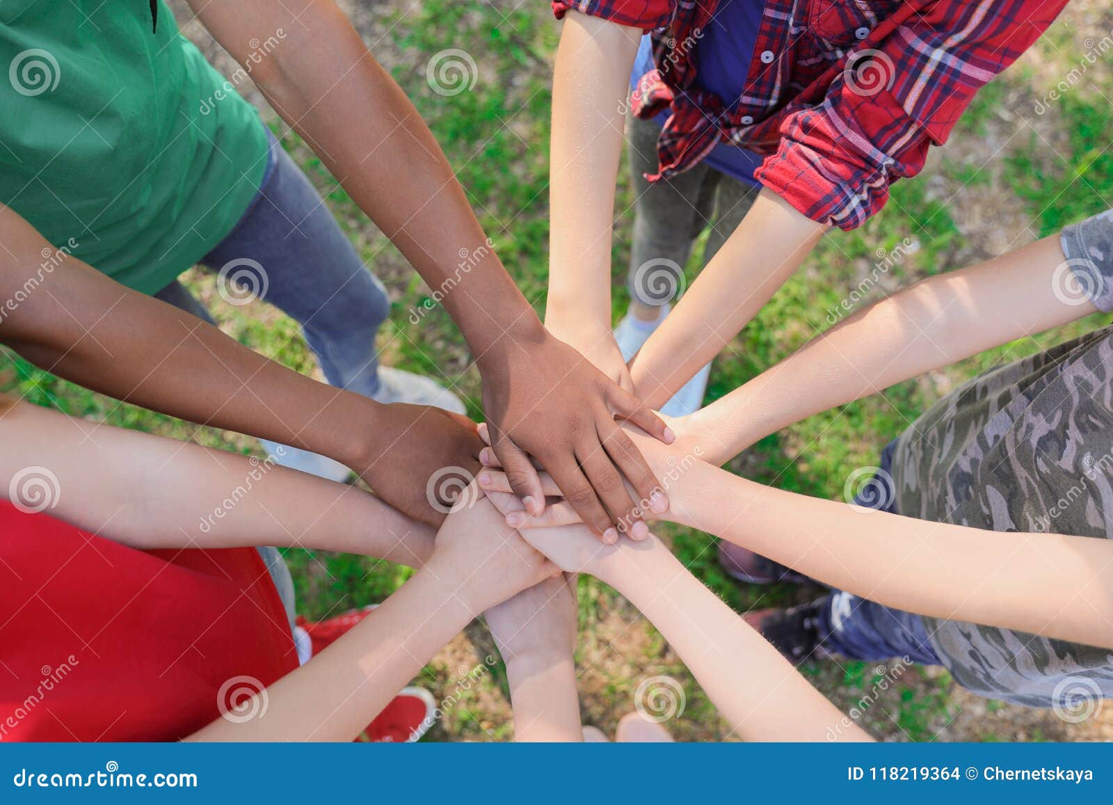 Group of Children Putting Hands Together Outdoors Stock Photo - Image ...