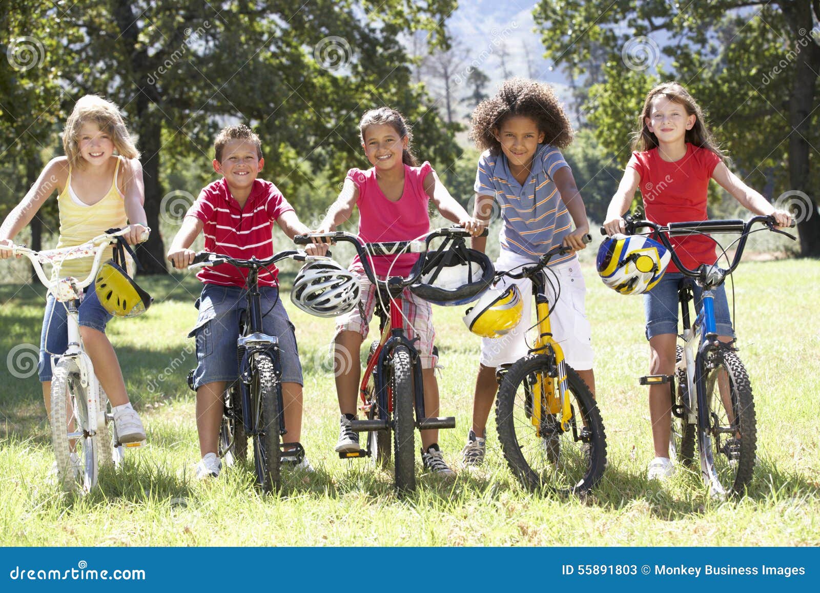 Group of Children Riding Bikes in Countryside Stock Image - Image of ...