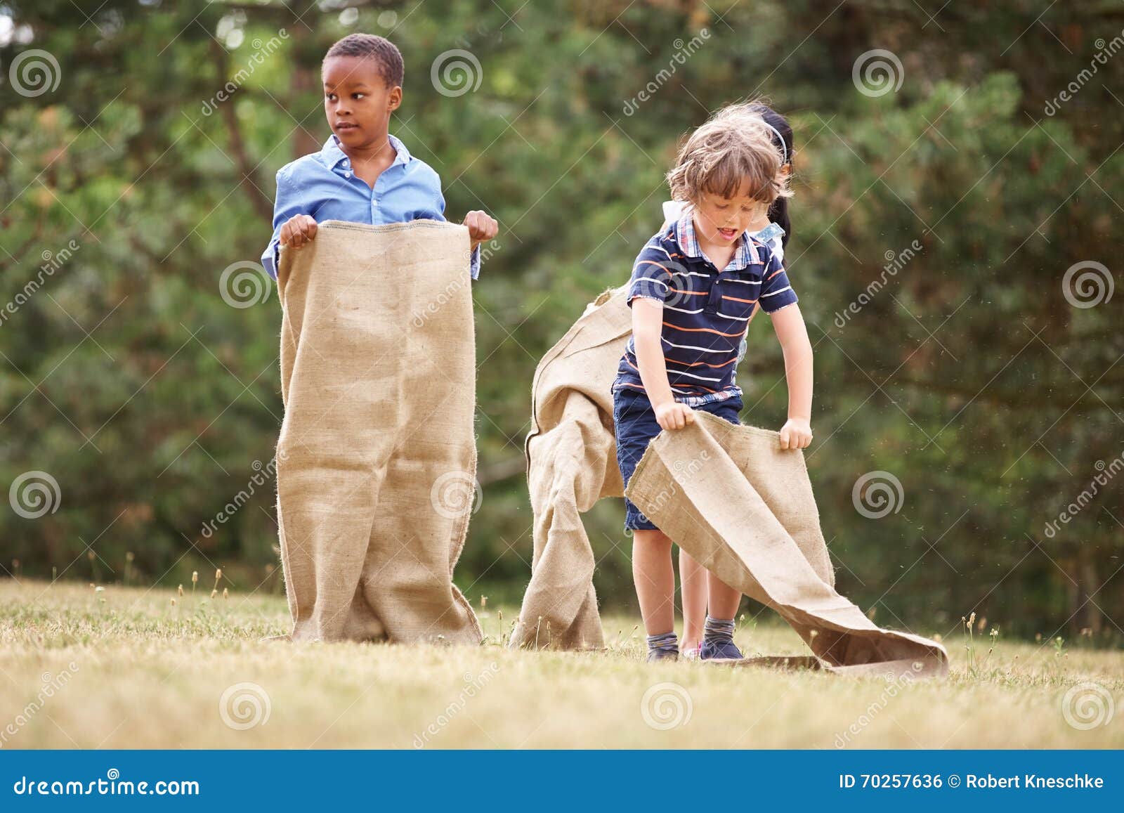 Group of Children at a Sack Race Stock Photo - Image of autumn ...